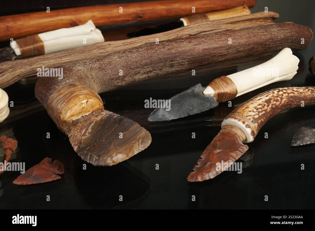 Stone Age Tools with Knives black Background Stock Photo - Alamy