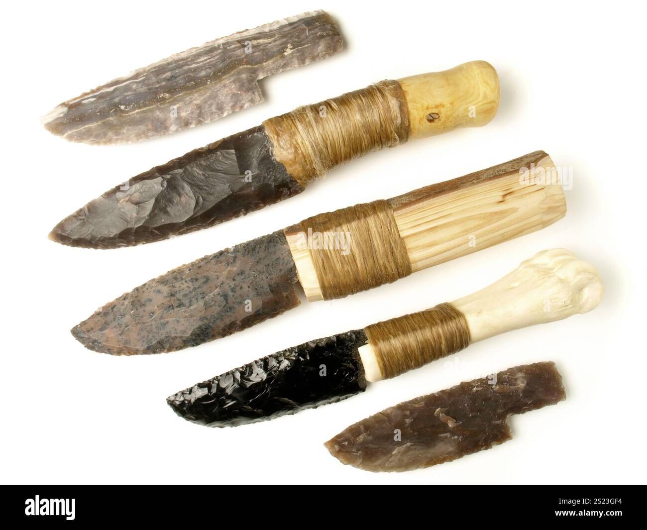 Stone Age Knives with Flintstone and Obsidian Blade isolated on white ...