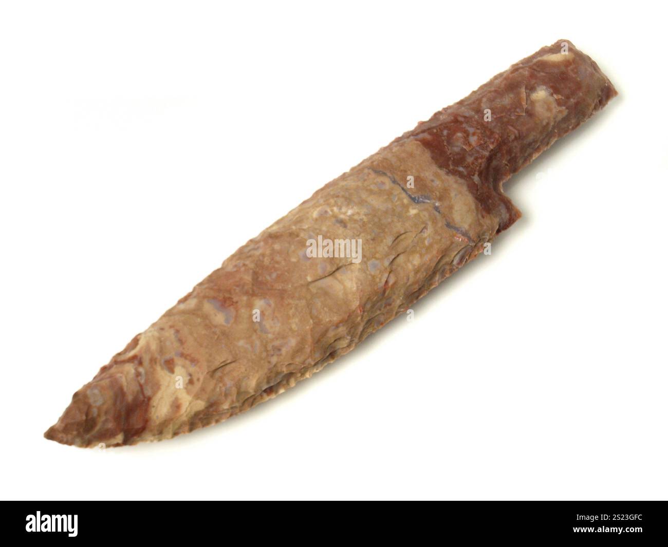Flintstone Knife Blade isolated on white Background Stock Photo - Alamy