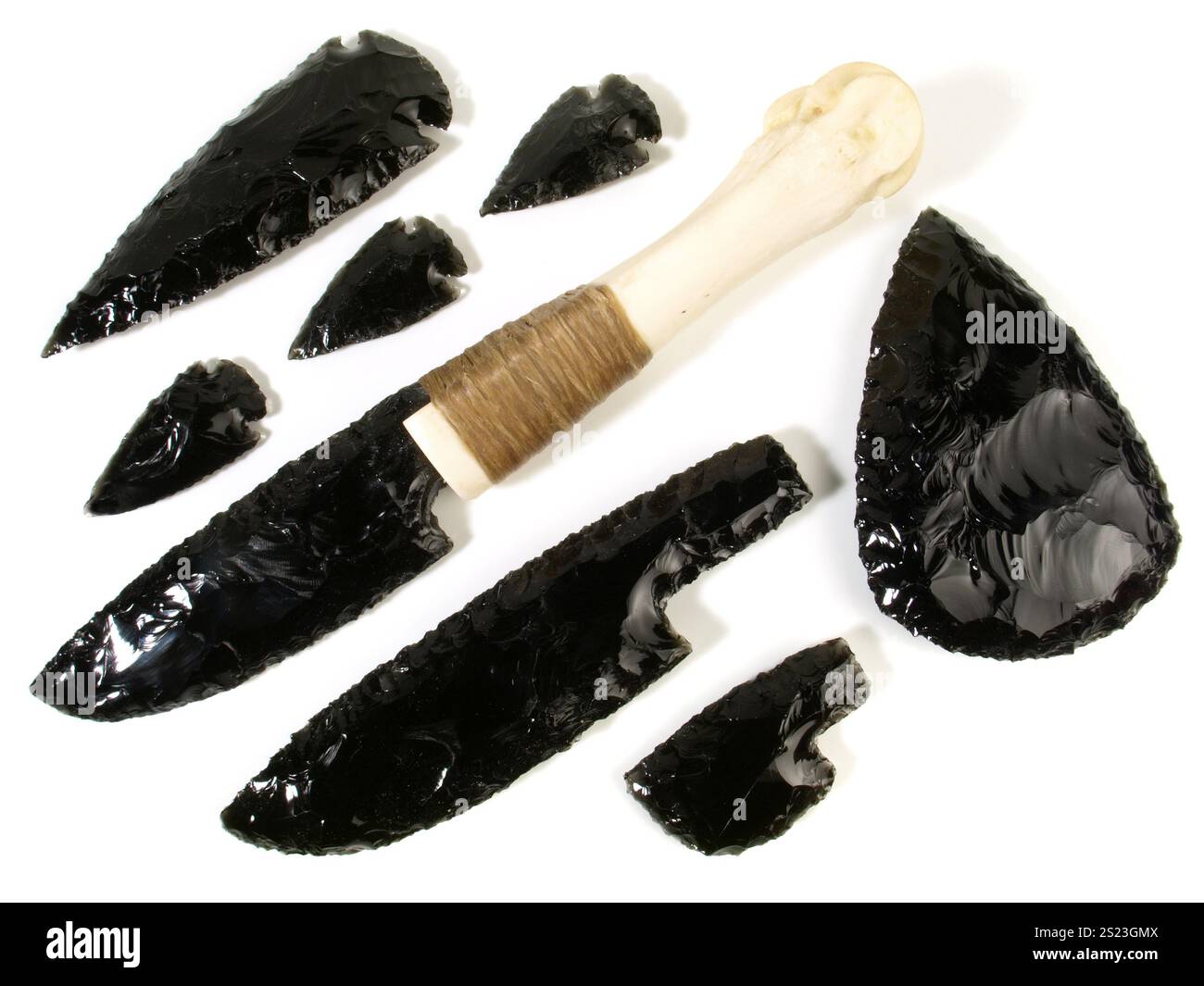 Stone Age Knife with Bone Handle and Obsidian Blade isolated on white ...