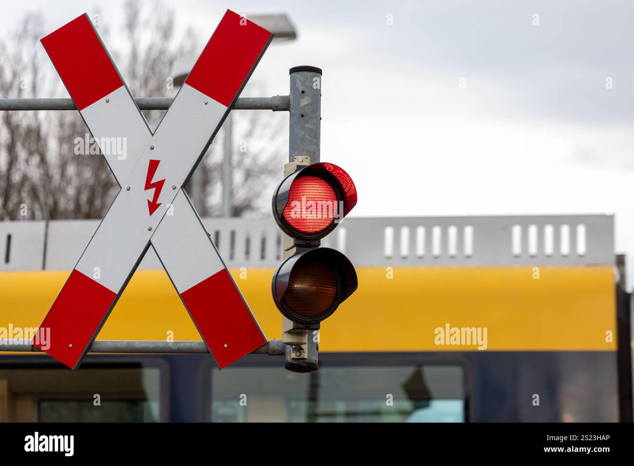 German Electrified Railway Crossing with Red Light and Traffic Sign ...
