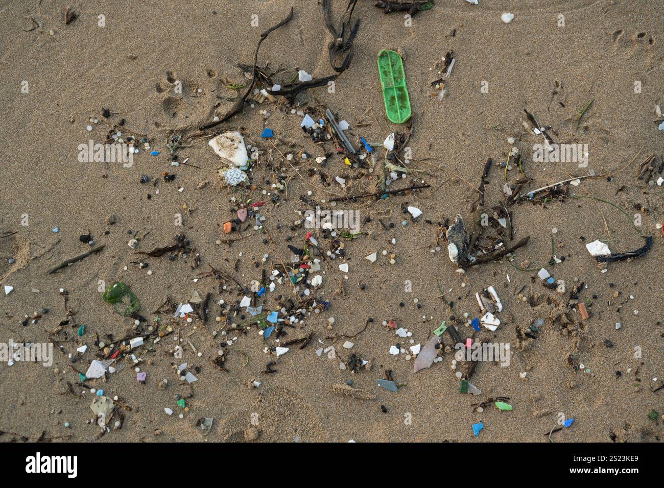 Small plastic particles on beach. Watergate Bay, Cornwall, UK Stock ...