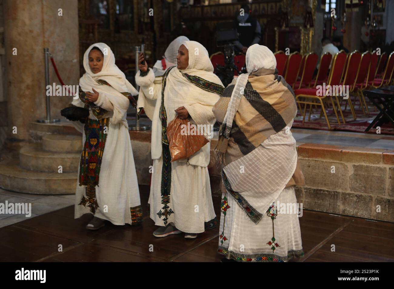 Christians take part in a Christmas Eve procession in Manger Square ...
