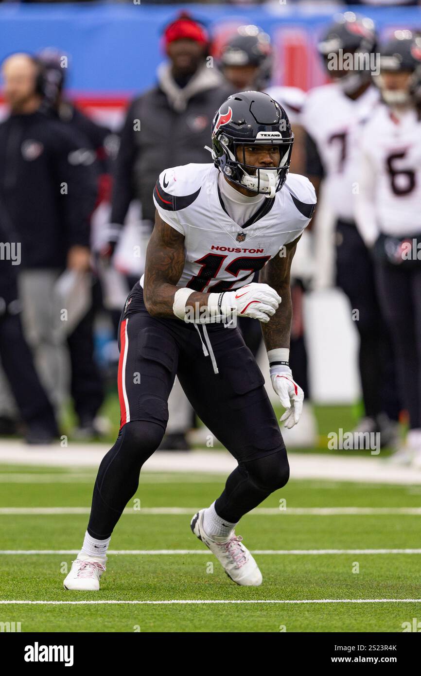 Houston Texans wide receiver Nico Collins (12) breaks off the line ...