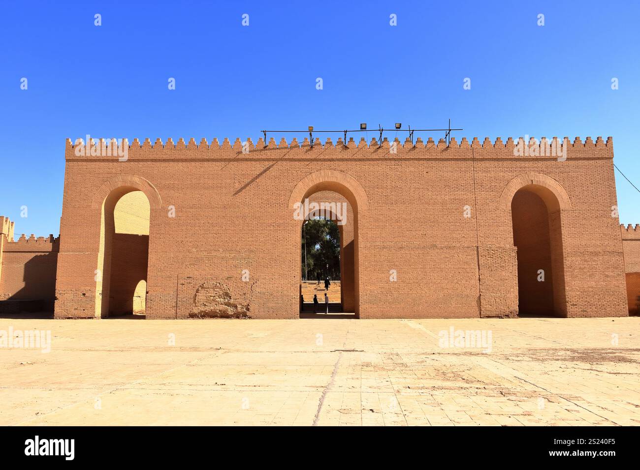 Babylon in Iraq - November 13 2024: people visit the old walls of the ...