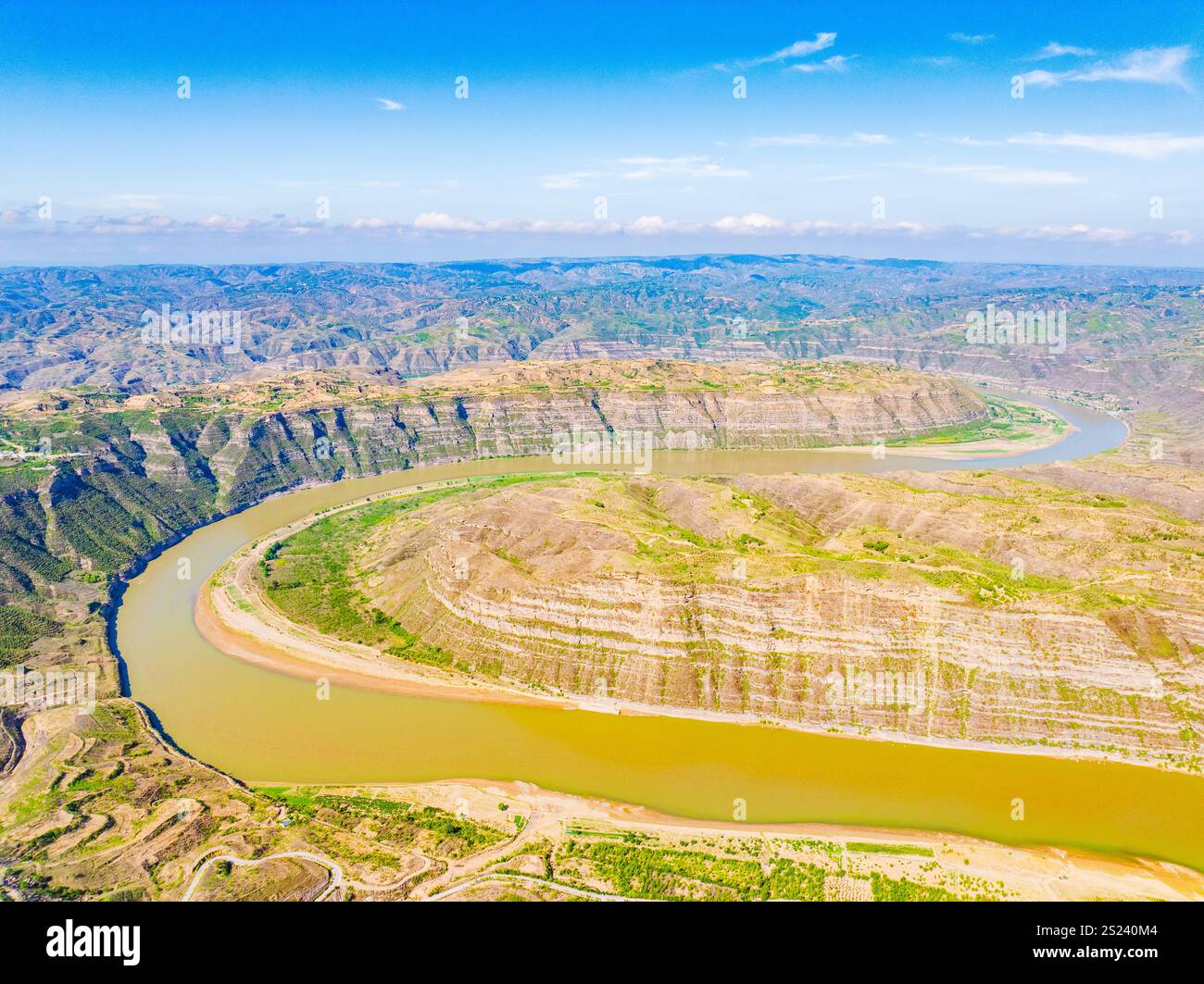 Sunny summer day in Yonghe Yellow River Snake Bend Geological Park in ...
