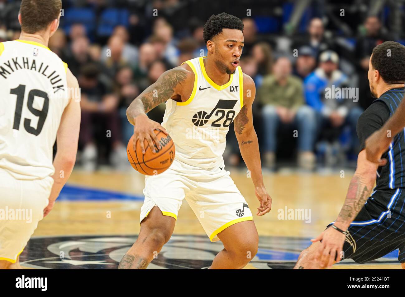 Orlando, Florida, USA, January 5, 2025, Utah Jazz guard Brice Sensabaugh #28 moves forward in ...