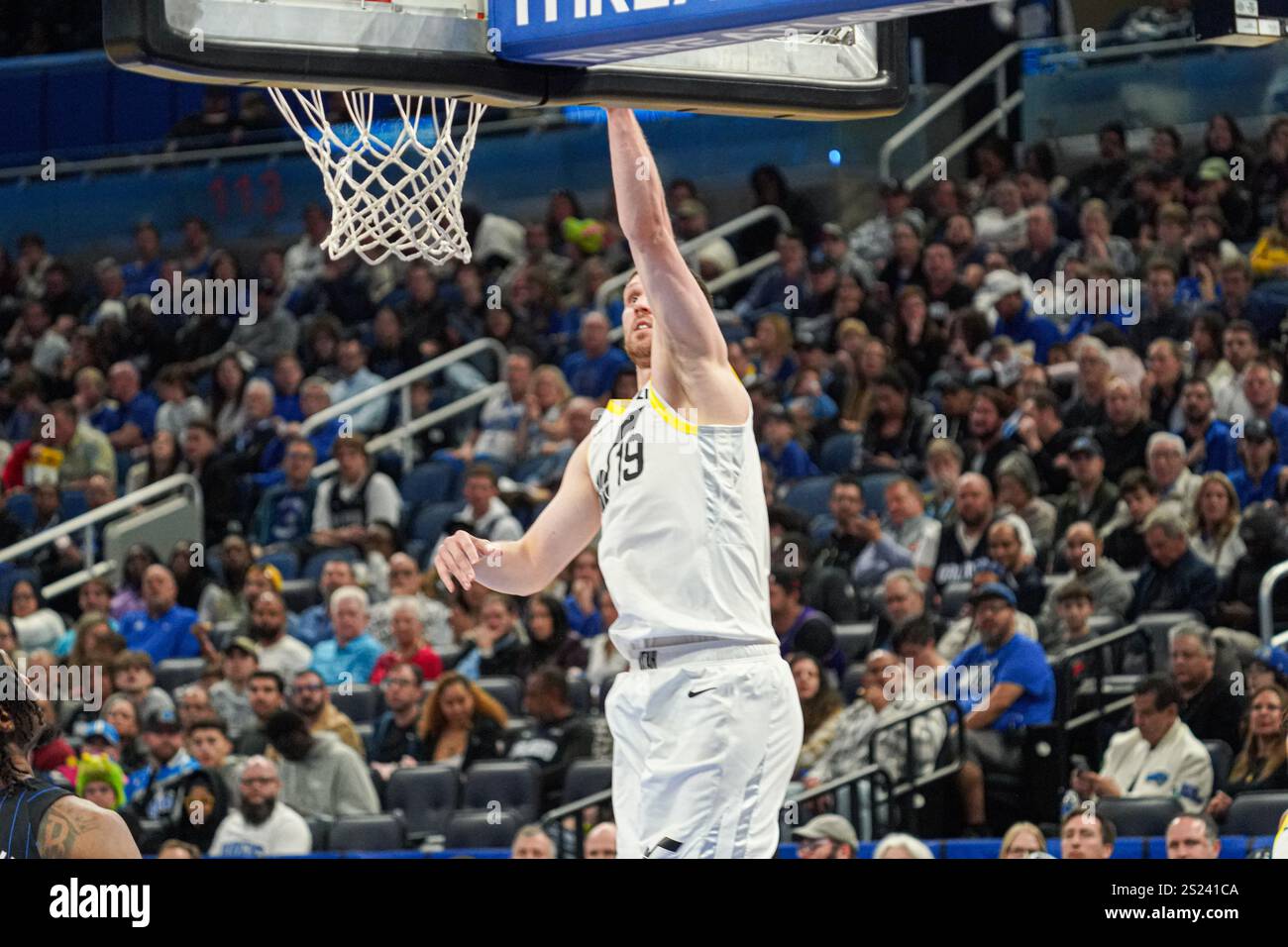 Orlando, Florida, USA, January 5, 2025, Utah Jazz forward Svi Mykhailuk #19 makes a basket in ...