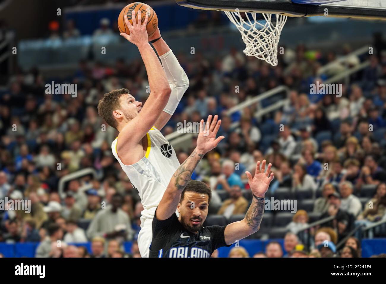 Orlando, Florida, USA, January 5, 2025, Utah Jazz center Walker Kessler #24 attempt to score at ...