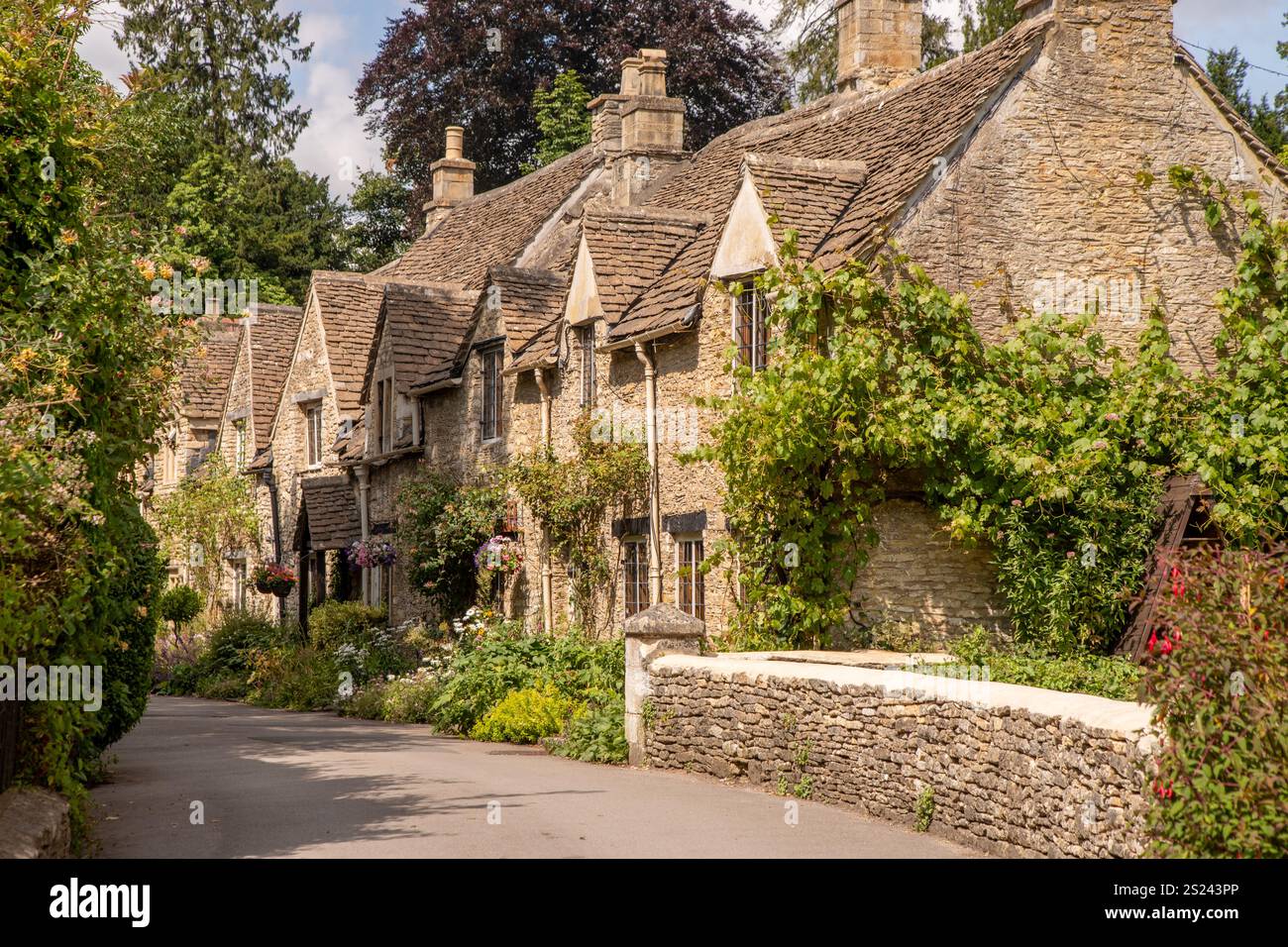 Old fashioned row of cottages at Castle Coombe, Wiltshire, England ...