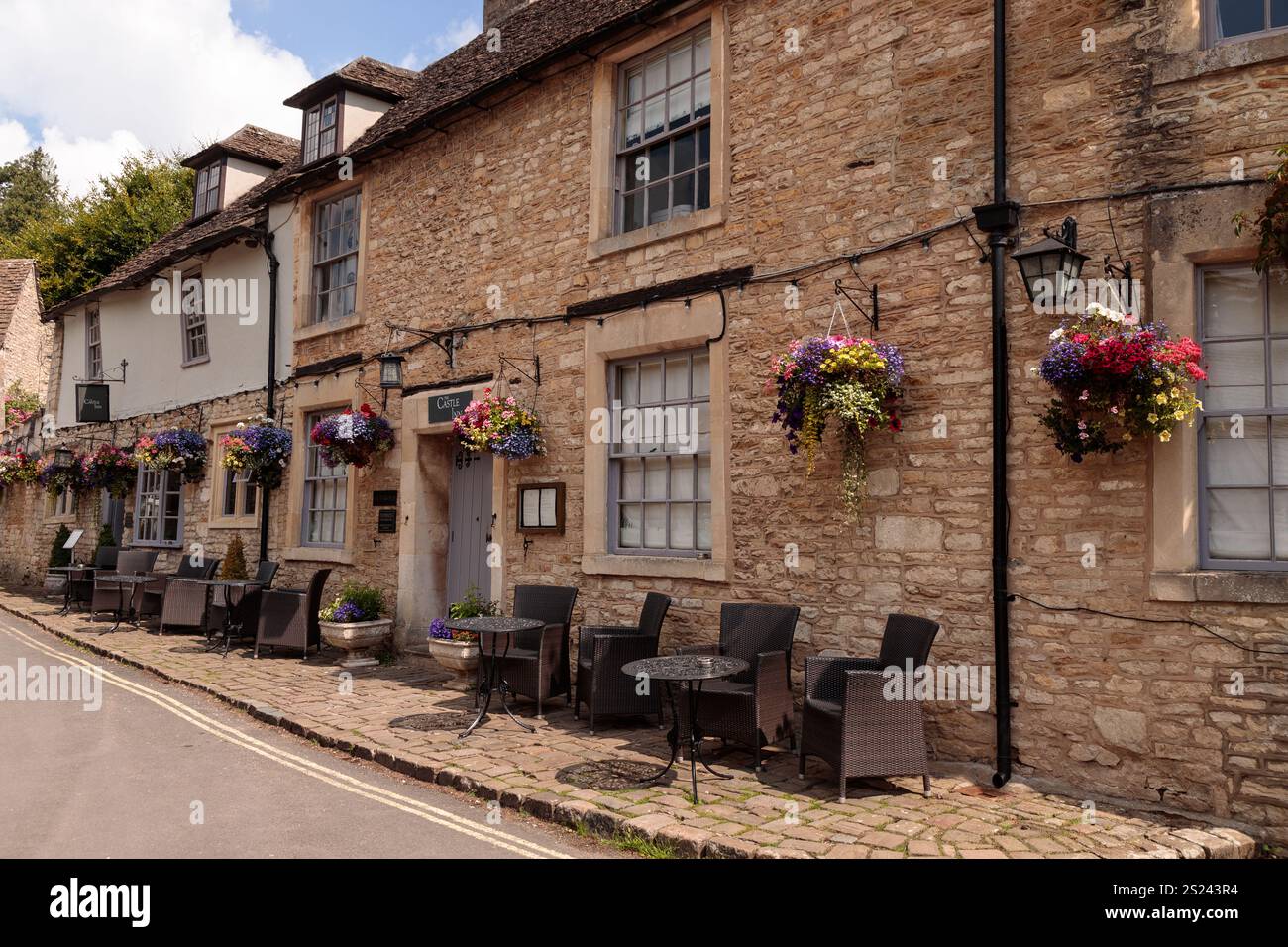 Old fashioned row of cottages at Castle Coombe, Wiltshire, England ...