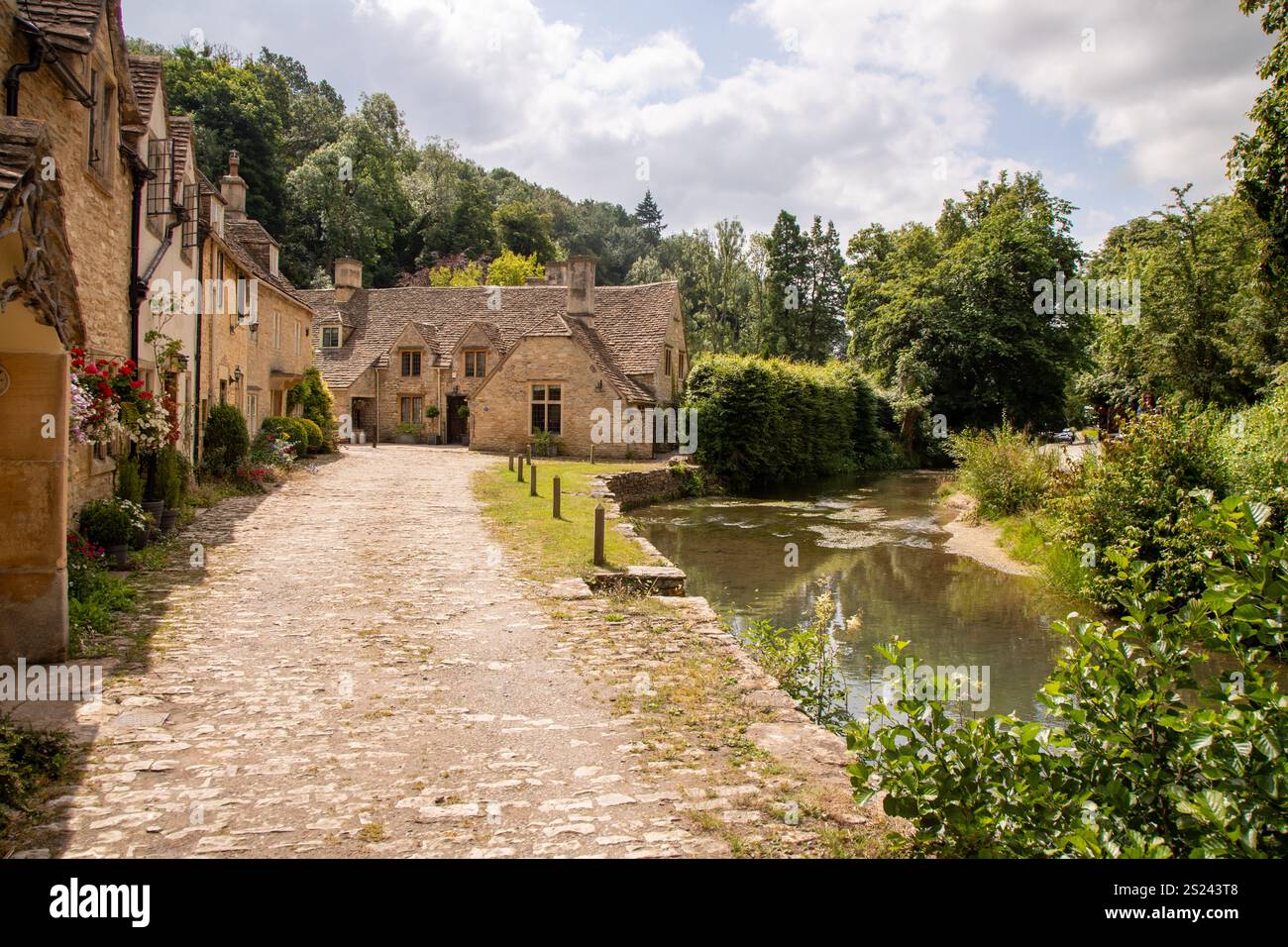 Old fashioned cottages on Water Lane in Castle Coombe, Wiltshire ...