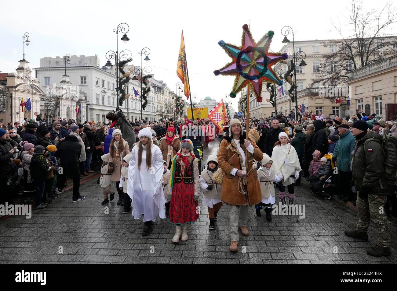 People take part in the annual Epiphany procession in Warsaw, Poland ...