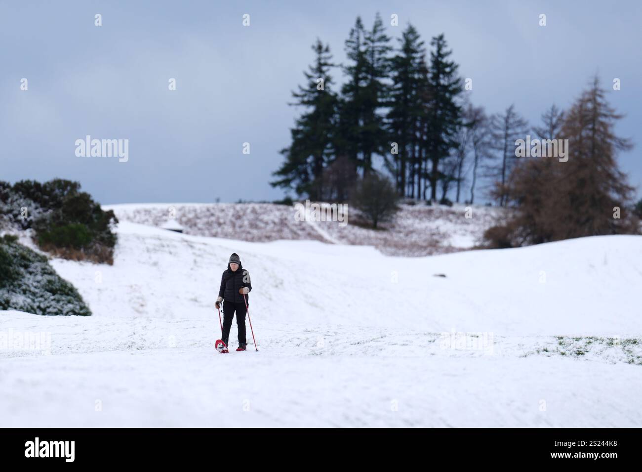 A walker at Gleneagles in Perthshire. Weather warnings remain in force ...