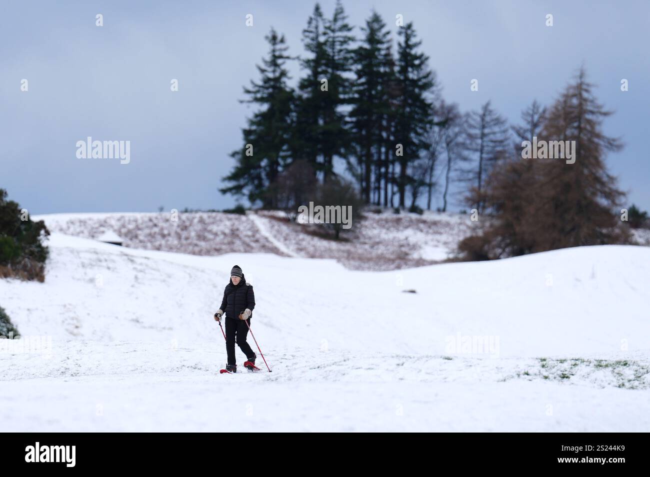 A walker at Gleneagles in Perthshire. Weather warnings remain in force ...