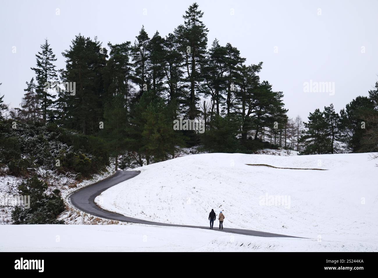 Walkers at Gleneagles in Perthshire. Weather warnings remain in force ...