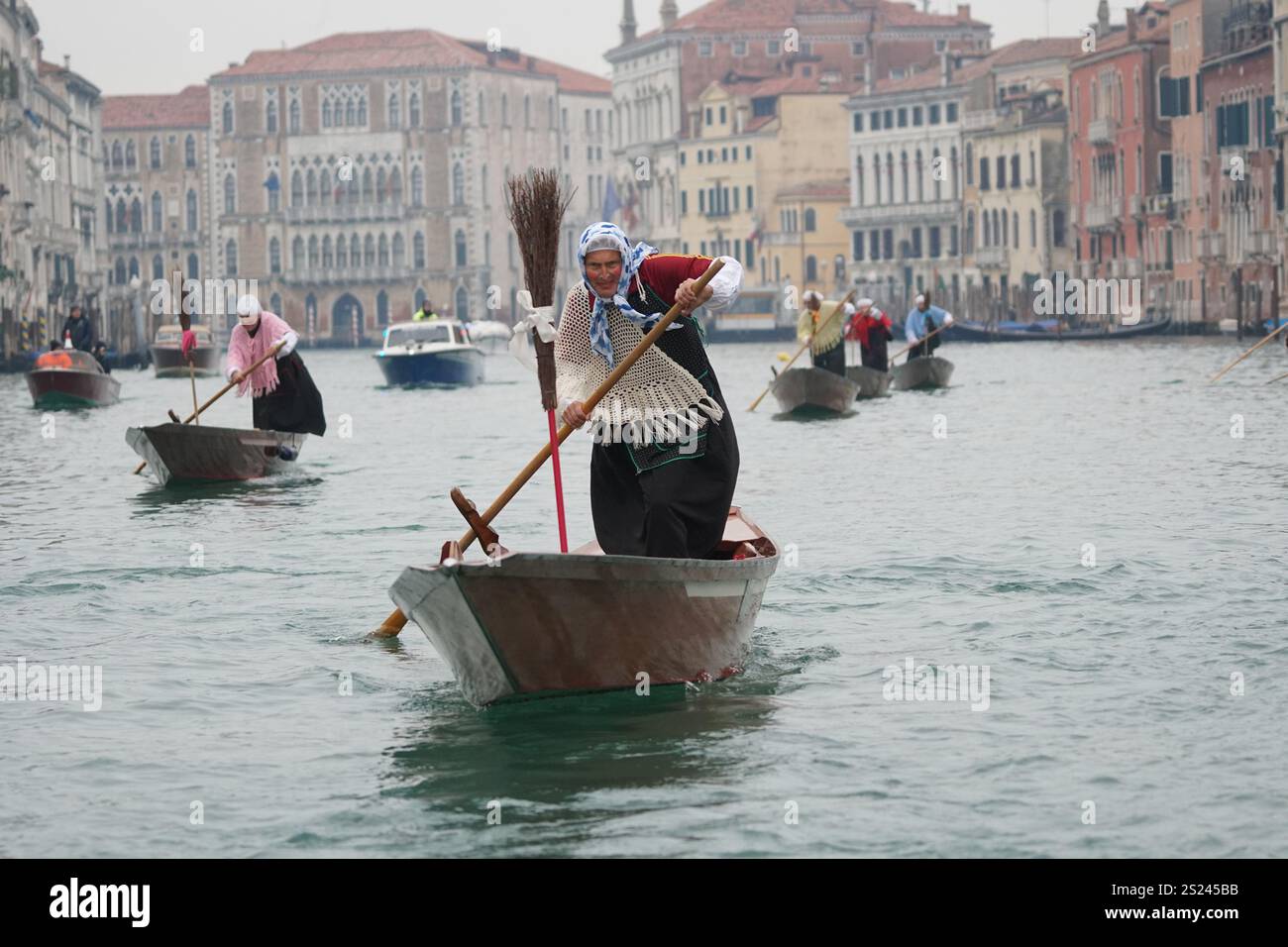 The traditional Befana Regatta along the Grand Canal in Venice, Italy ...