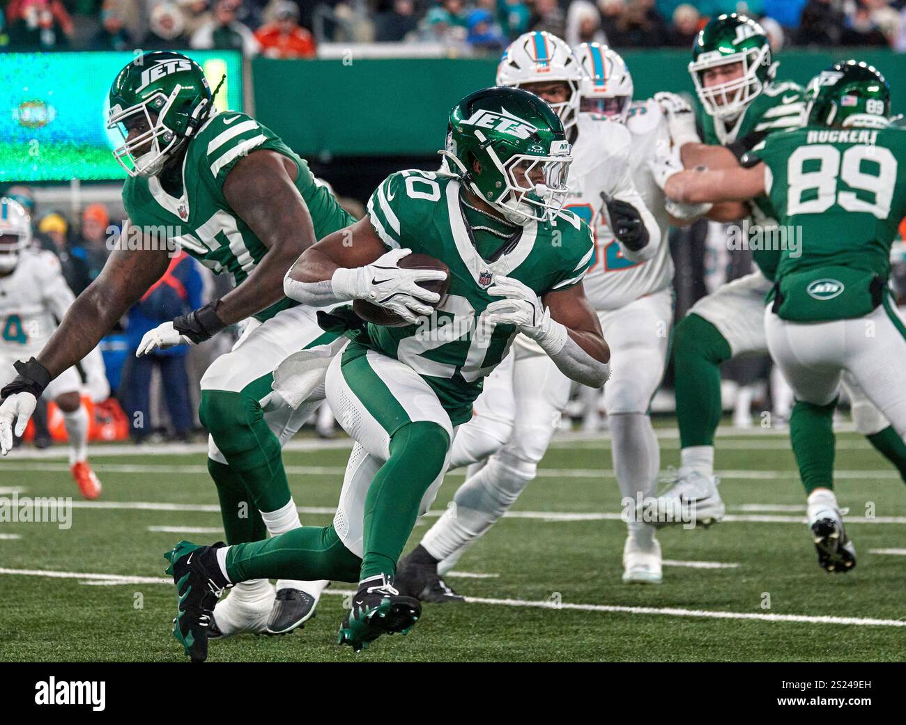 New York Jets running back Breece Hall (20) makes a move up field ...