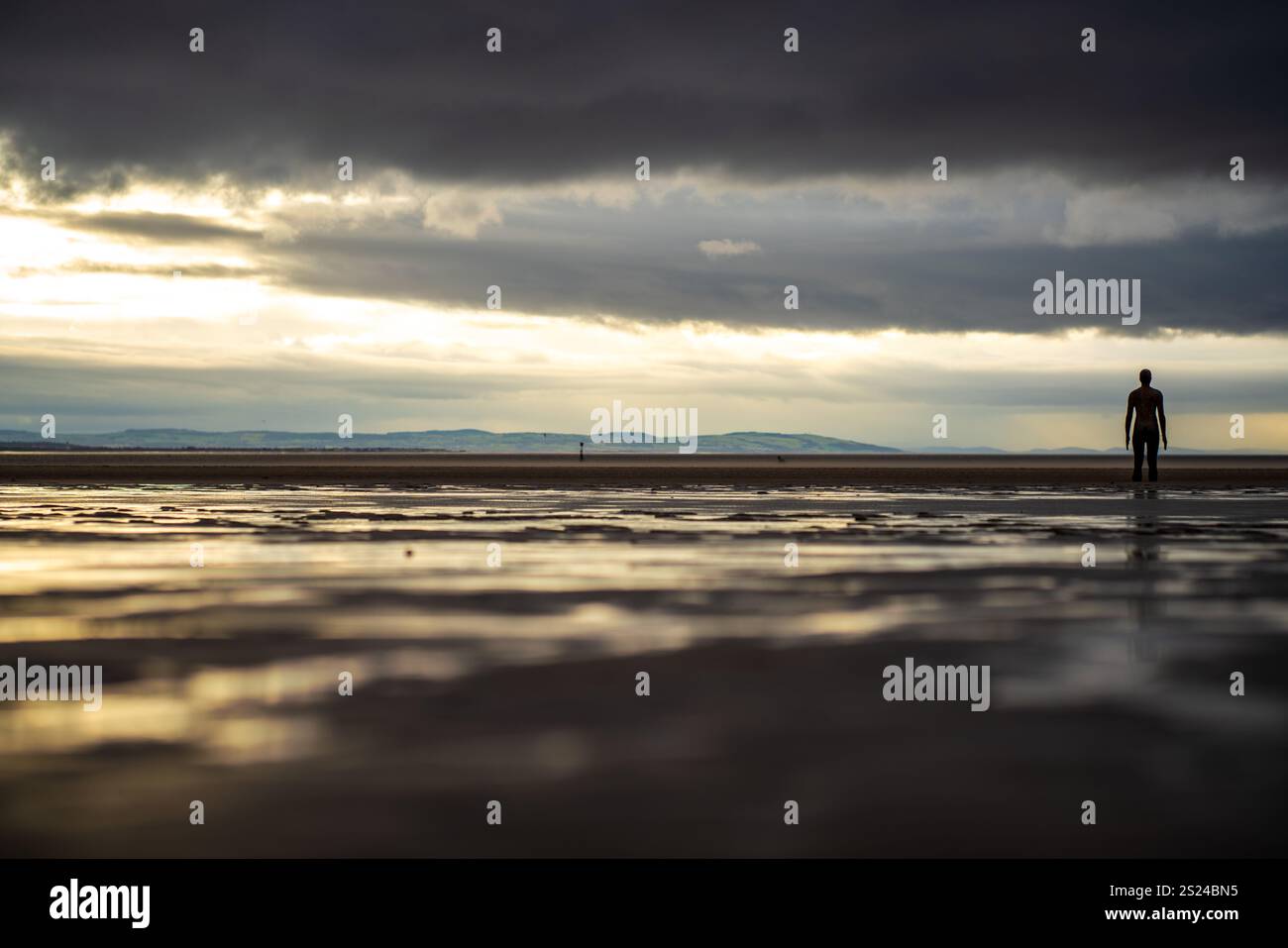 'Another Place' by Antony Gormley. Life-size, cast iron figures ...