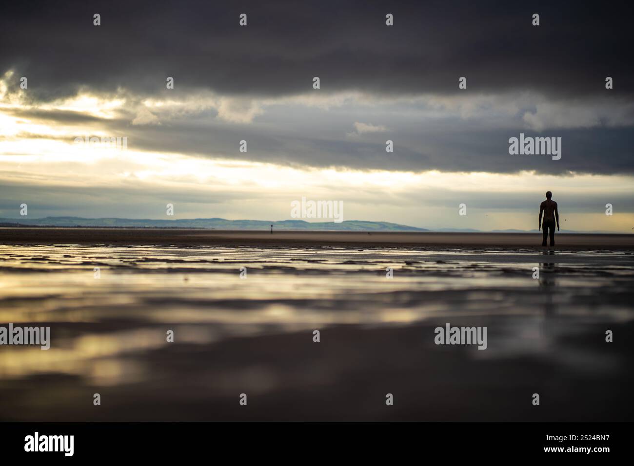 'Another Place' by Antony Gormley. Life-size, cast iron figures ...