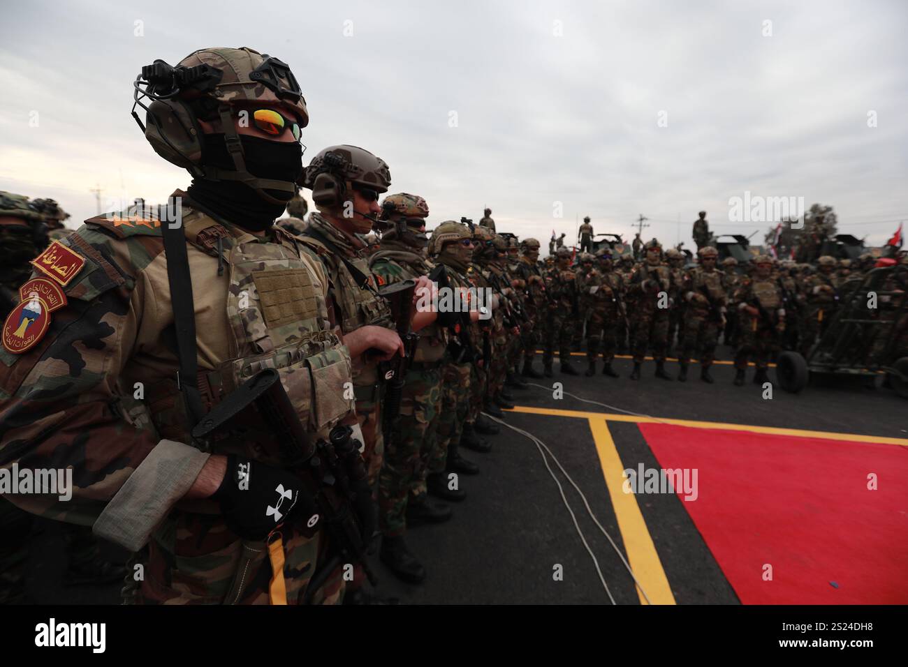 Taji, Iraq. 06th Jan, 2025. Iraqi soldiers take part in the Army Day ...