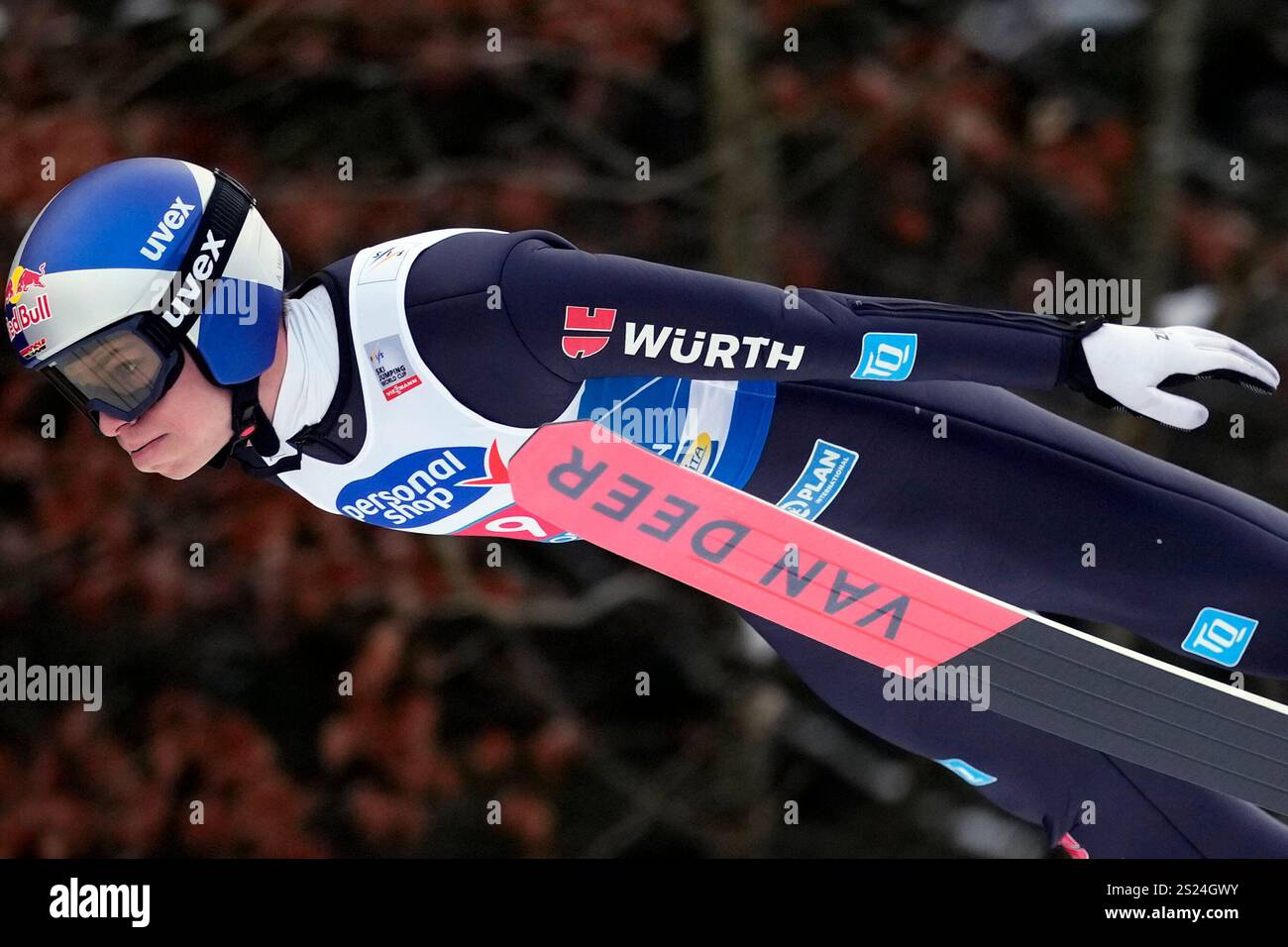 Andreas Wellinger, of Germany, soars through the air during his trial ...