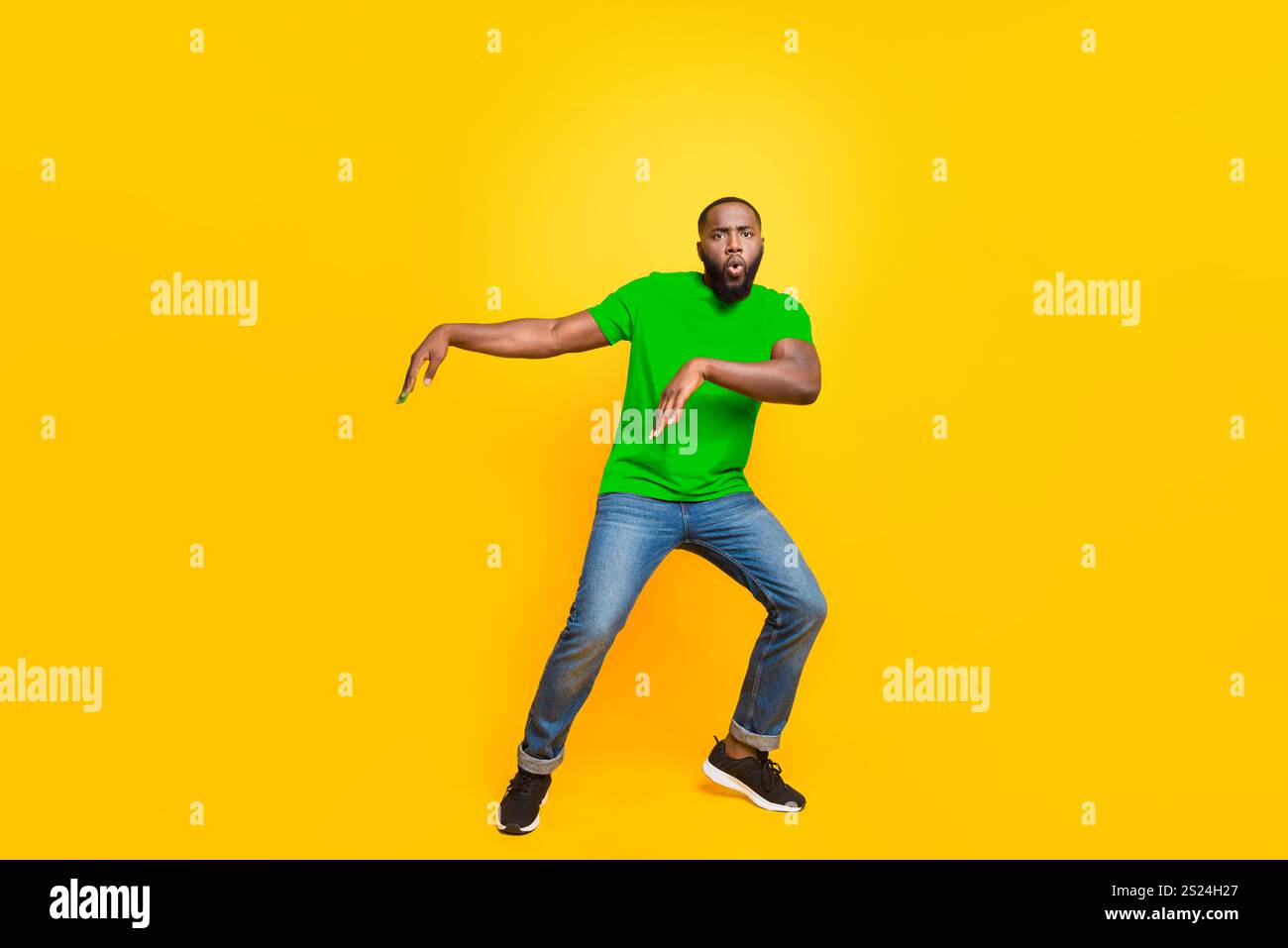 Full length body size photo of black man dancing with face serious ...