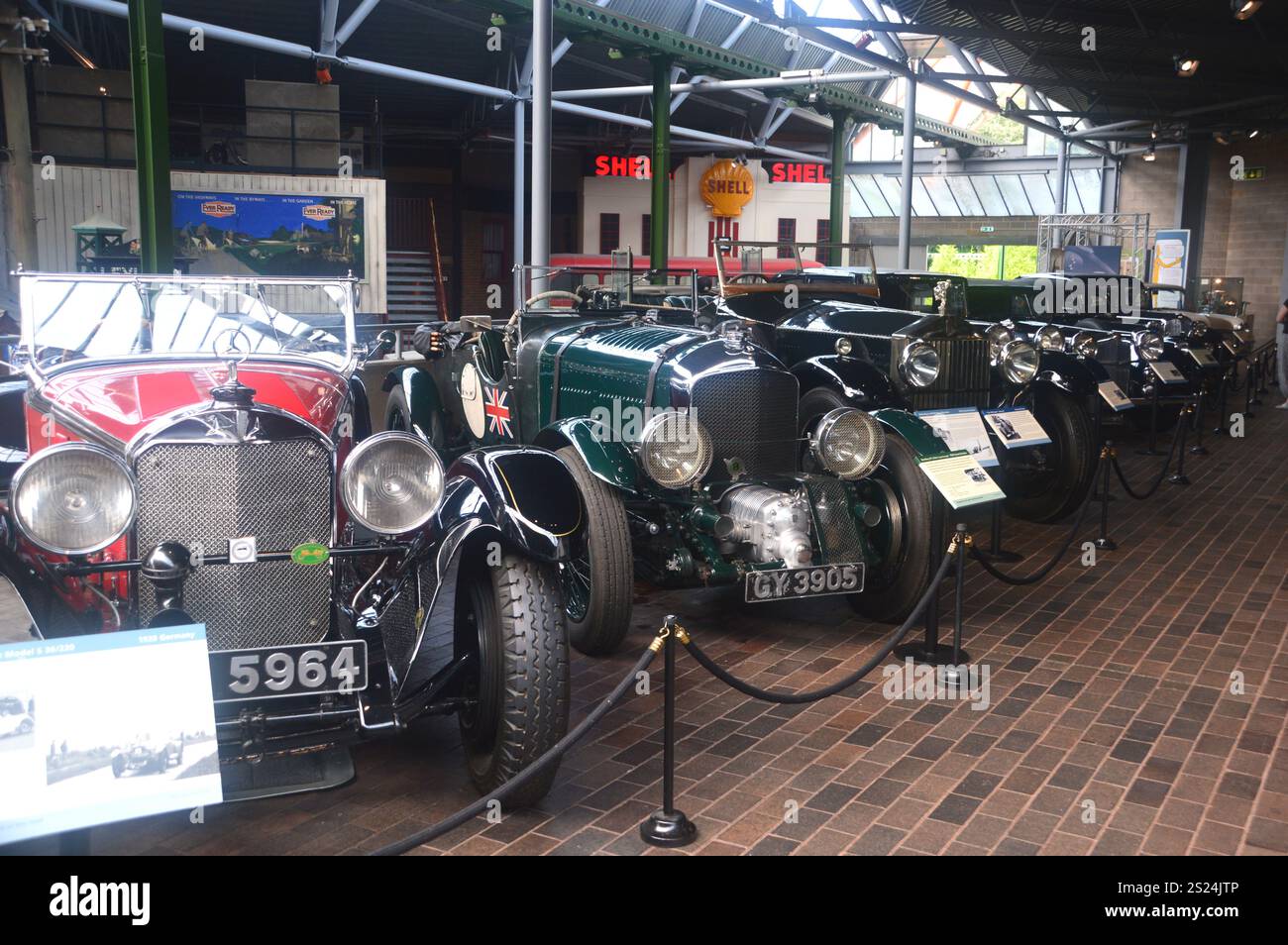 A Row of Old Vintage Cars on Display at the National Motor Museum Trust ...