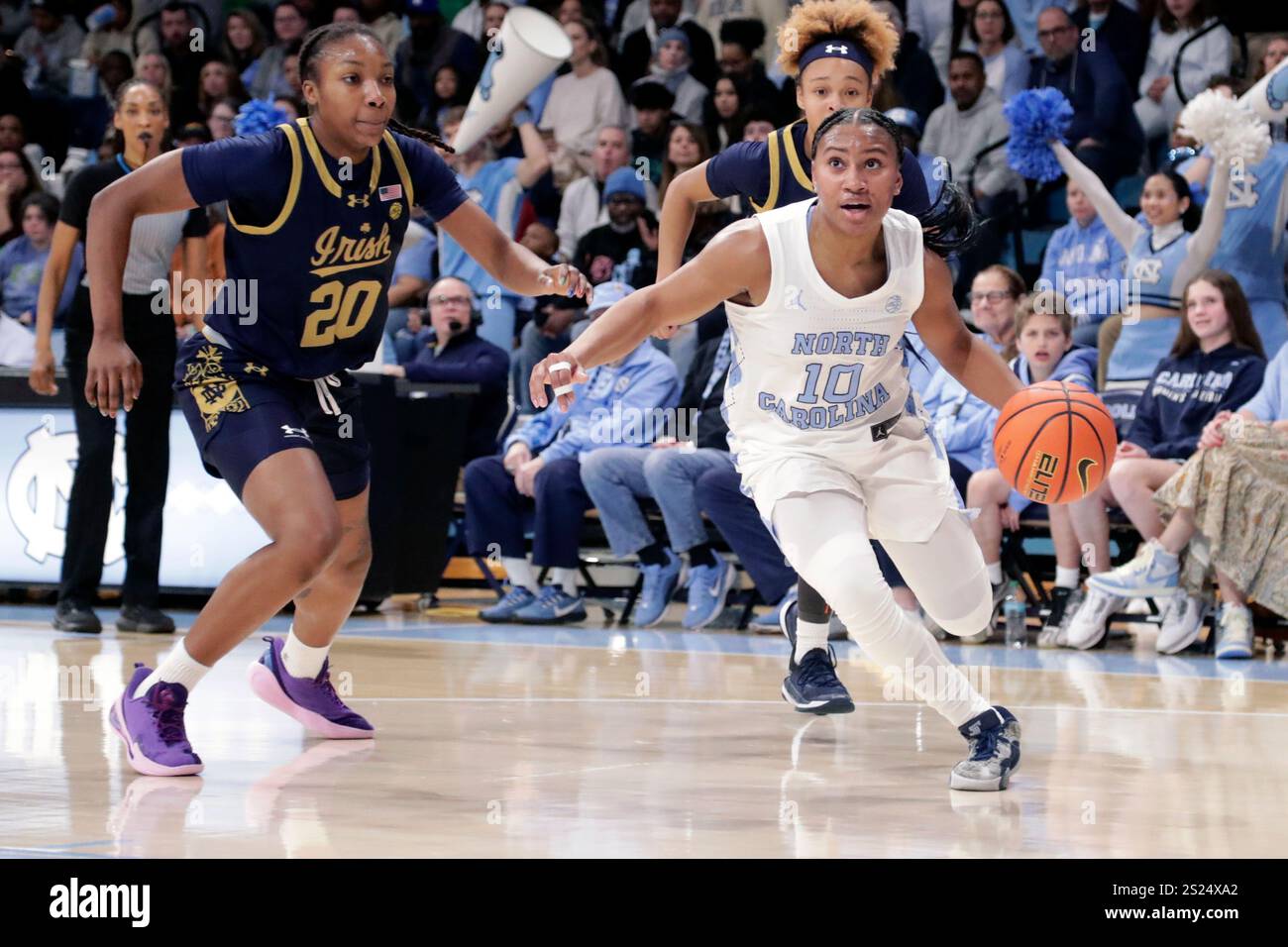 North Carolina guard Reniya Kelly (10) drives around Notre Dame forward ...