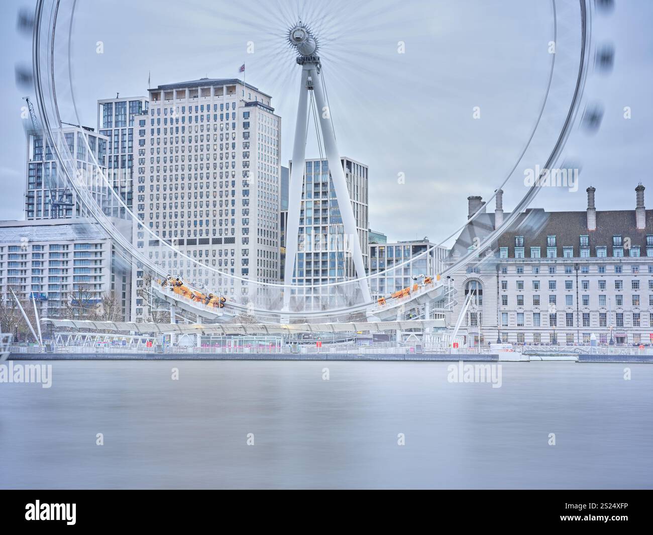 Rotating London Eye ferris wheel, next the river Thames, Westminster ...