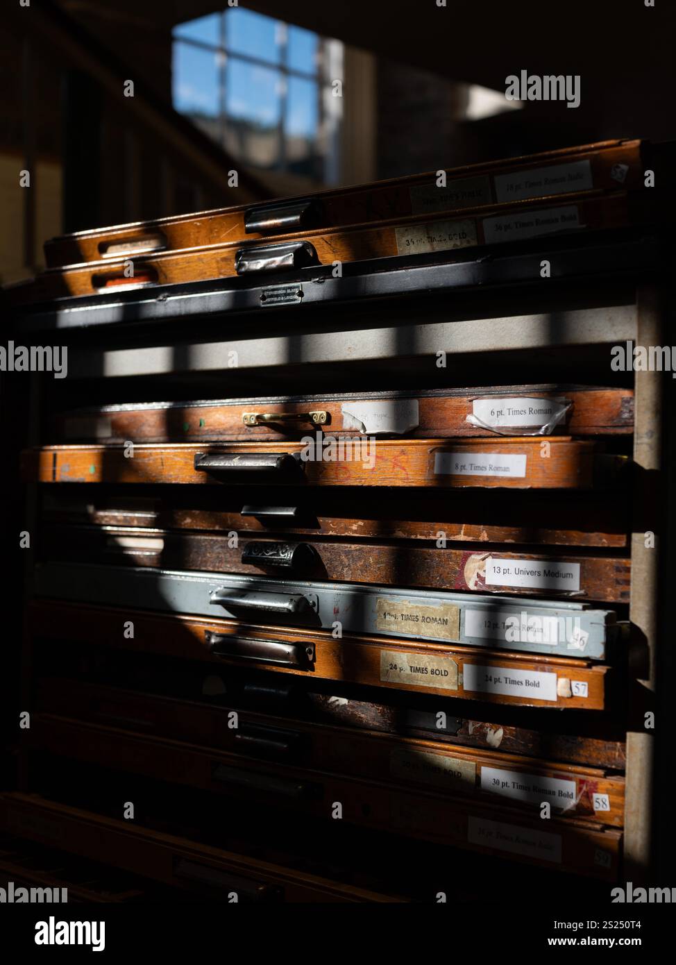 A letterpress printers cabinet with drawers with typeface names Stock ...