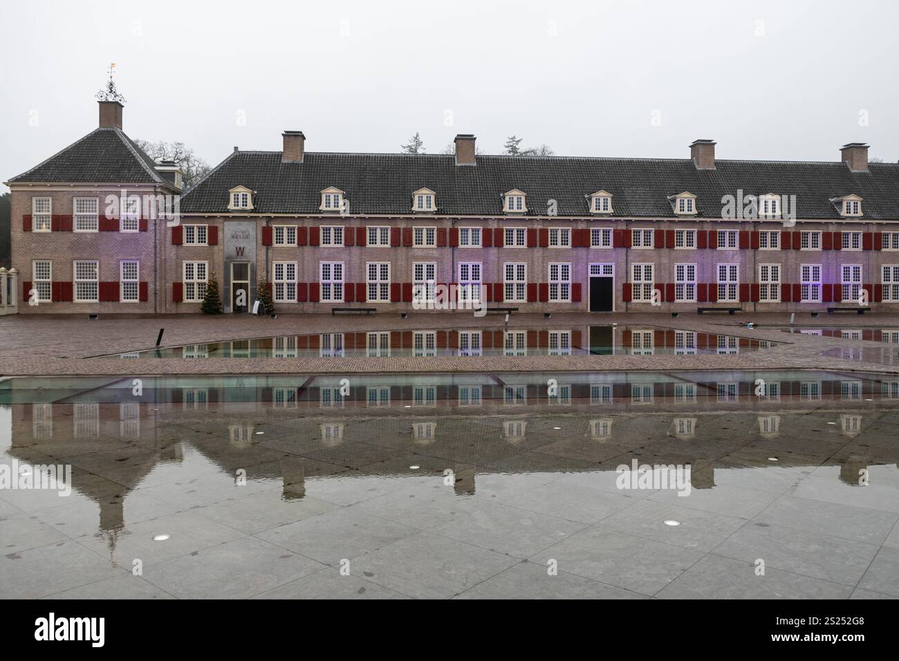Winter at Dutch palace Paleis Het Loo in the Netherlands. cold grey sky ...