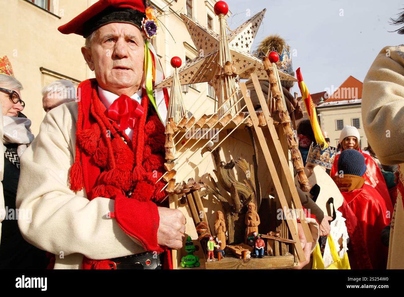 Krakow, Poland. 06th Jan, 2025. A man holds a small Nativity of Jesus ...