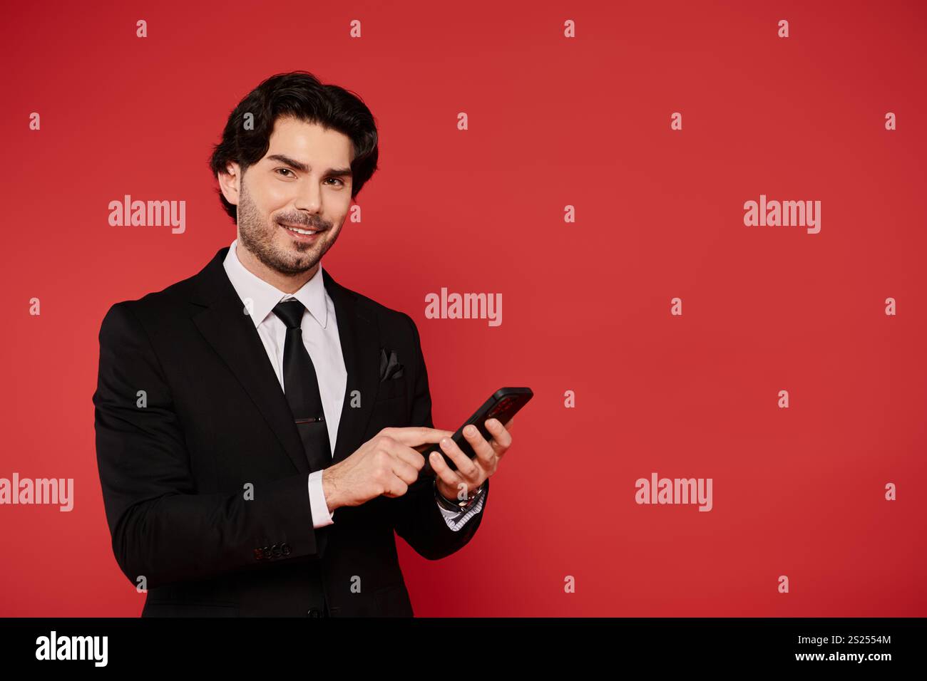 A stylish young man dressed in formal attire displays confidence while ...