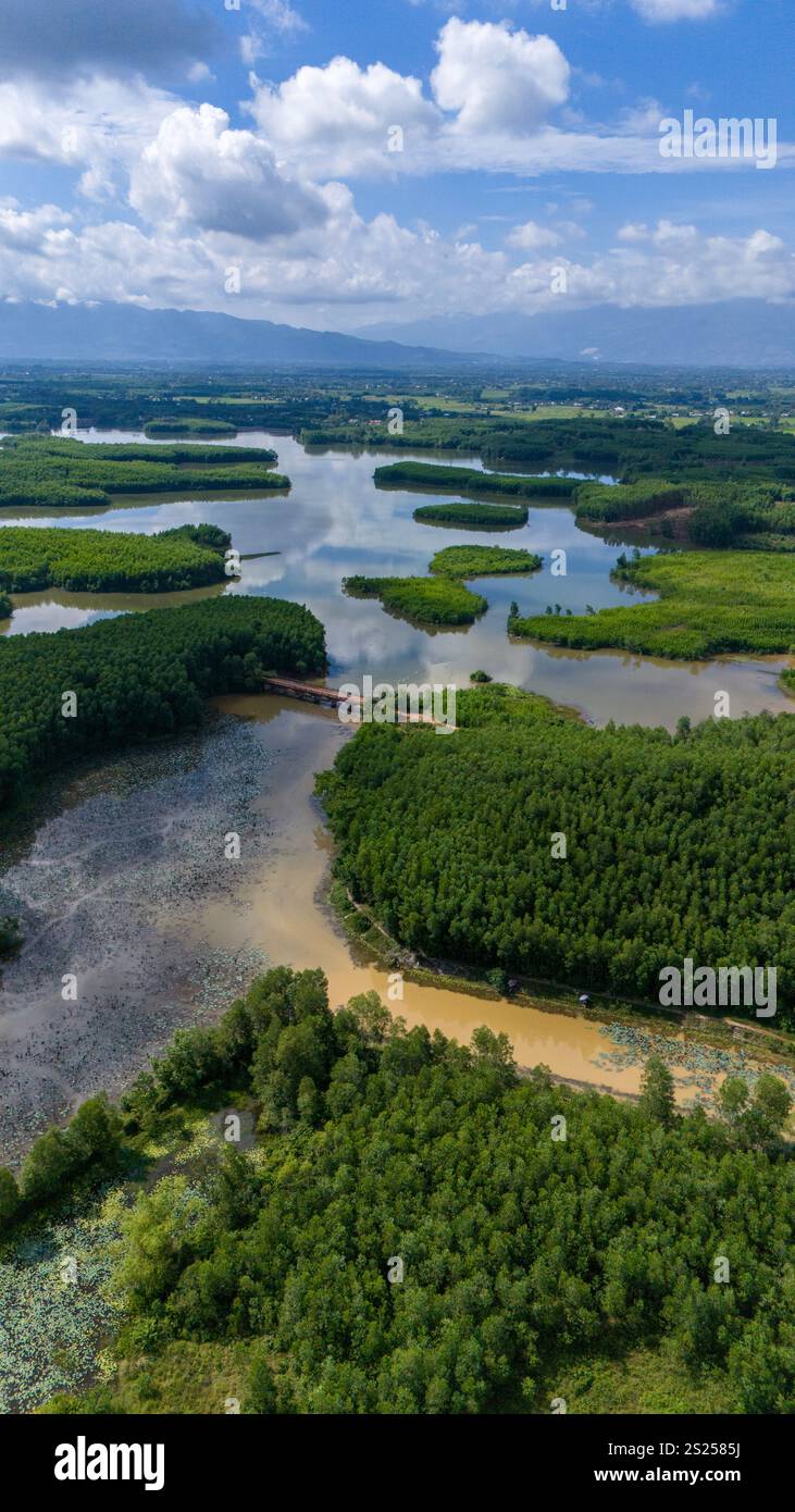 Aerial view of the forest with lakes and rivers near My Son ruin in ...