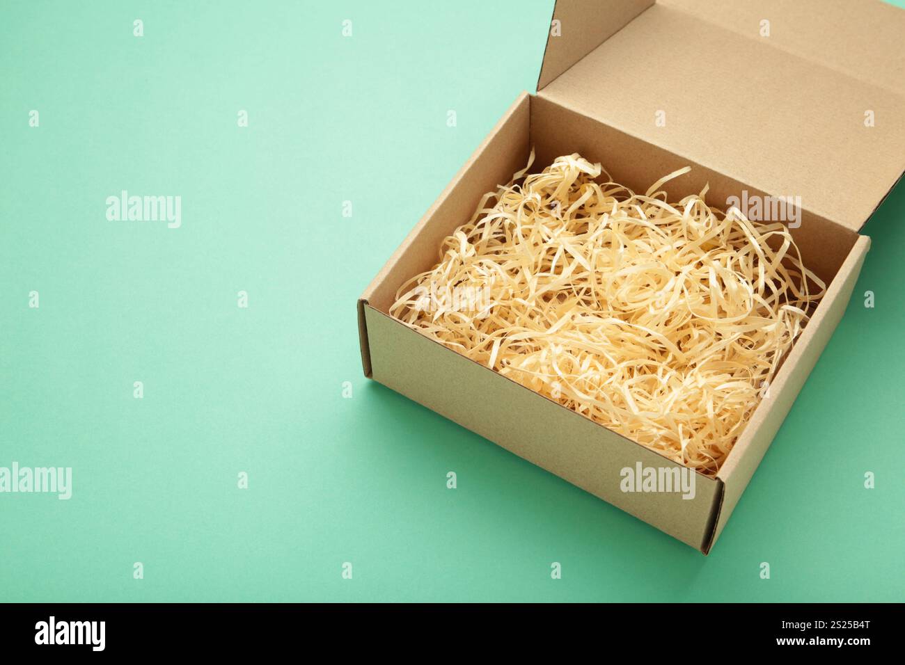 Brown Paper box Cardboard box on mint background. Top view Stock Photo ...