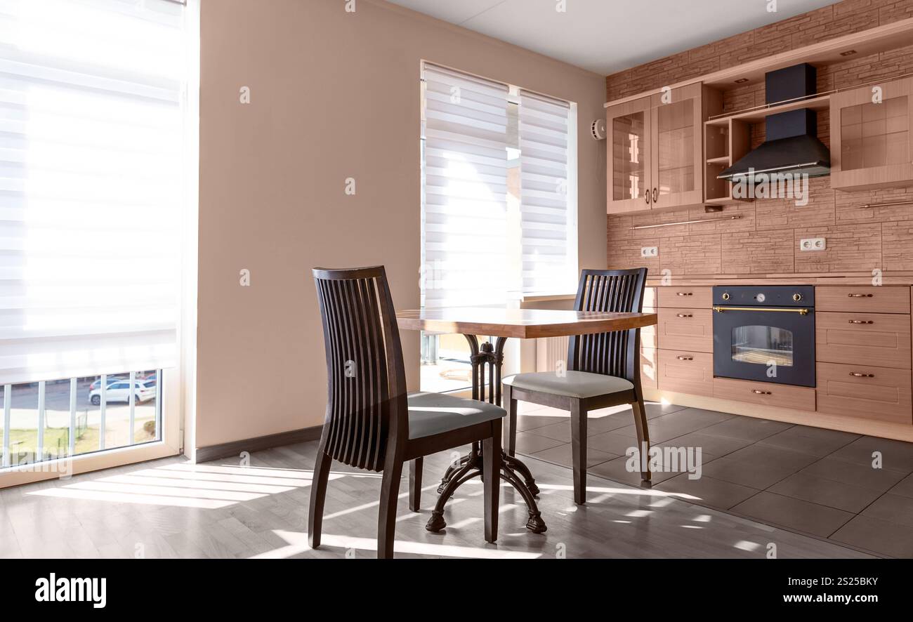 Modern interior of a combined kitchen and living room with colors of ...