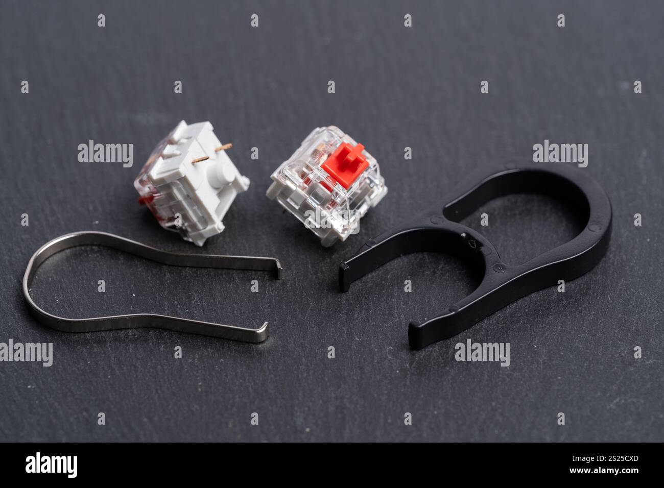 Red keys mechanical keyboard and brackets for their installation Stock ...