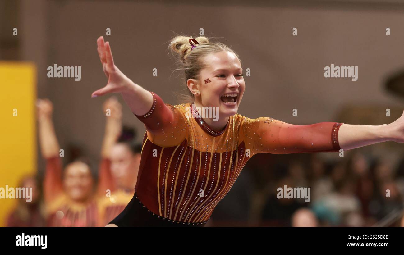 Minnesota's Emily Koch competes in balance beam during an NCAA ...