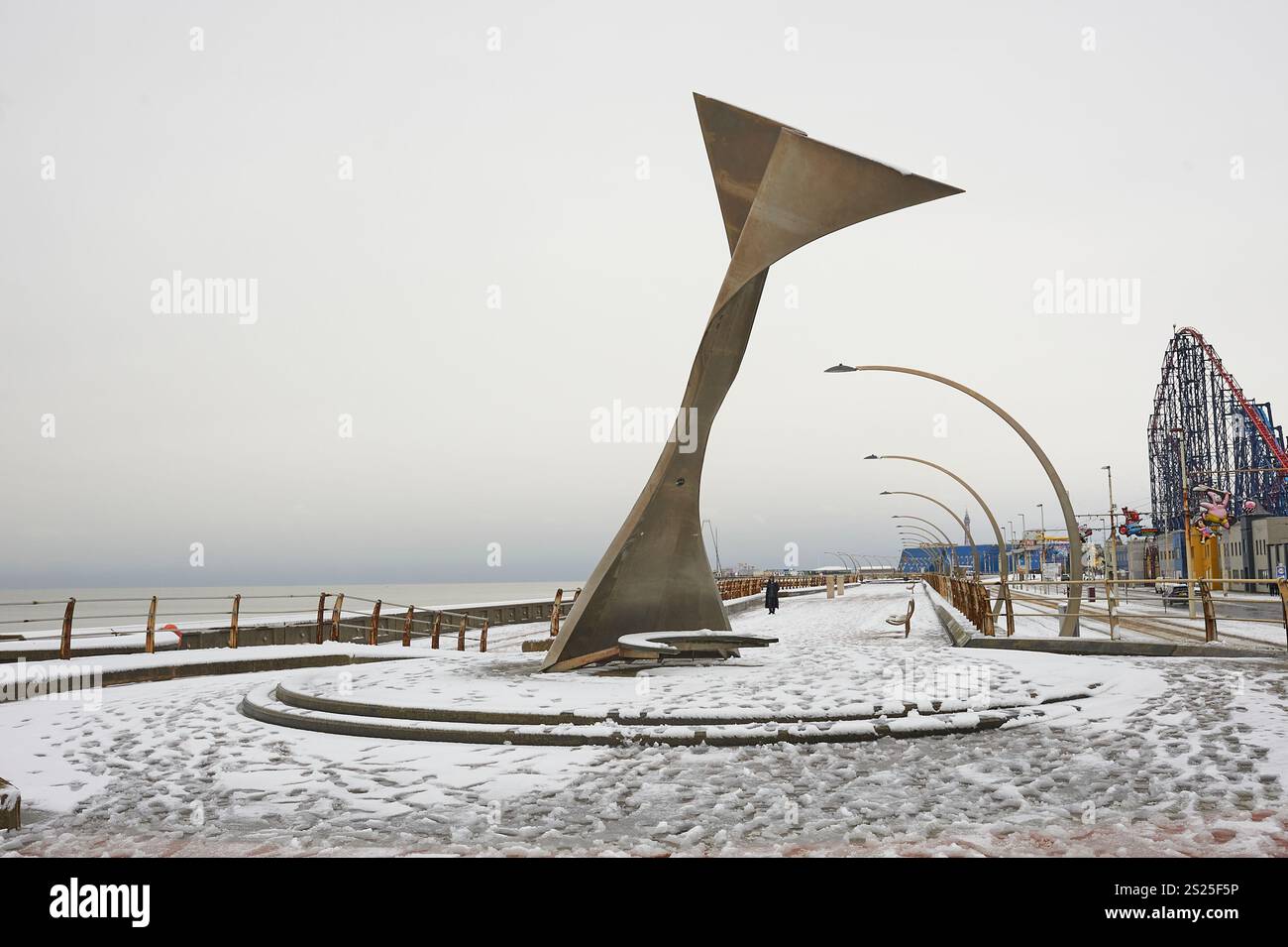 Solitary figure on an otherwise empty promenade in Blackpool during the ...