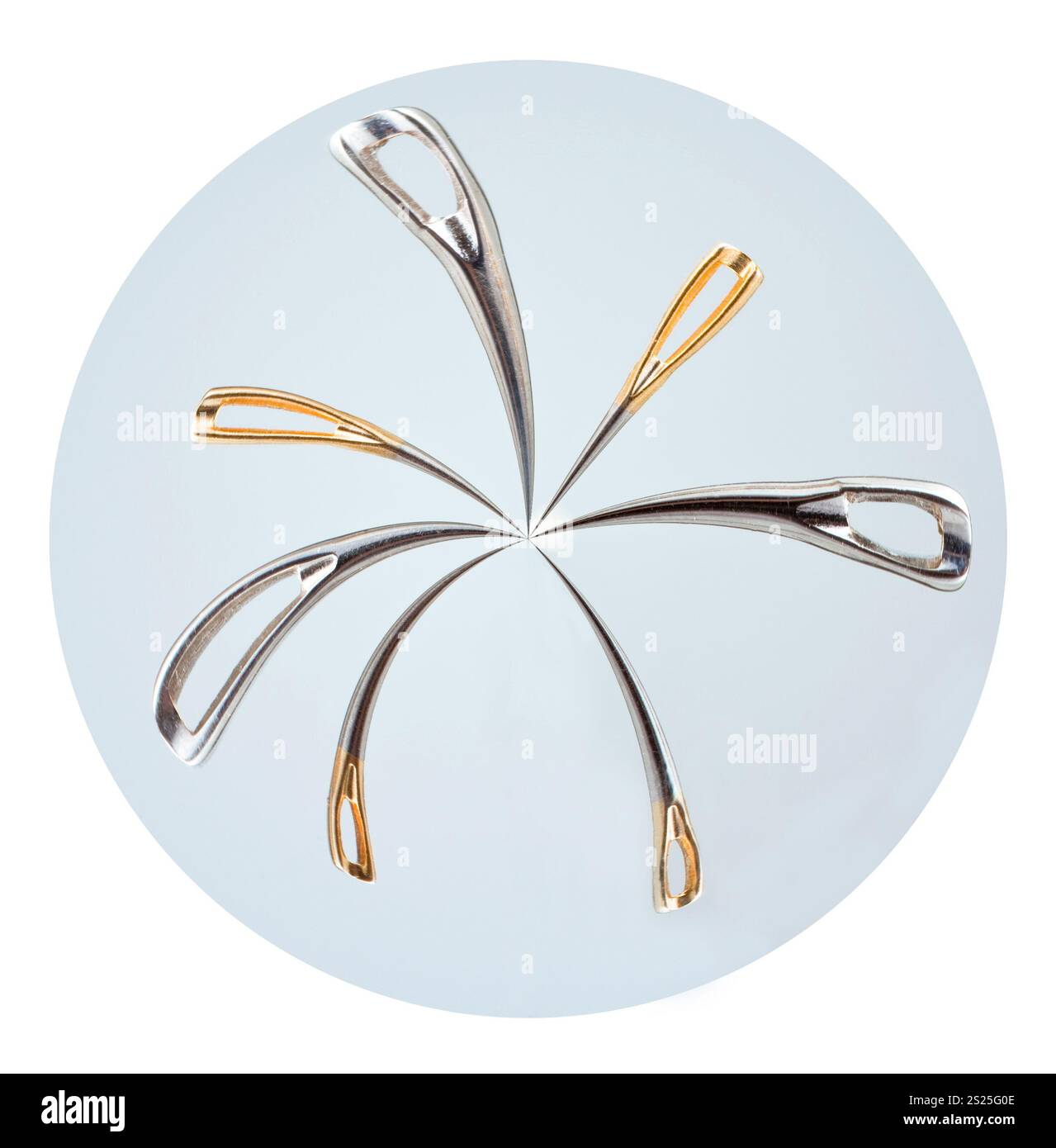 spherical distorted needle eyes close up on blue isolated on white ...