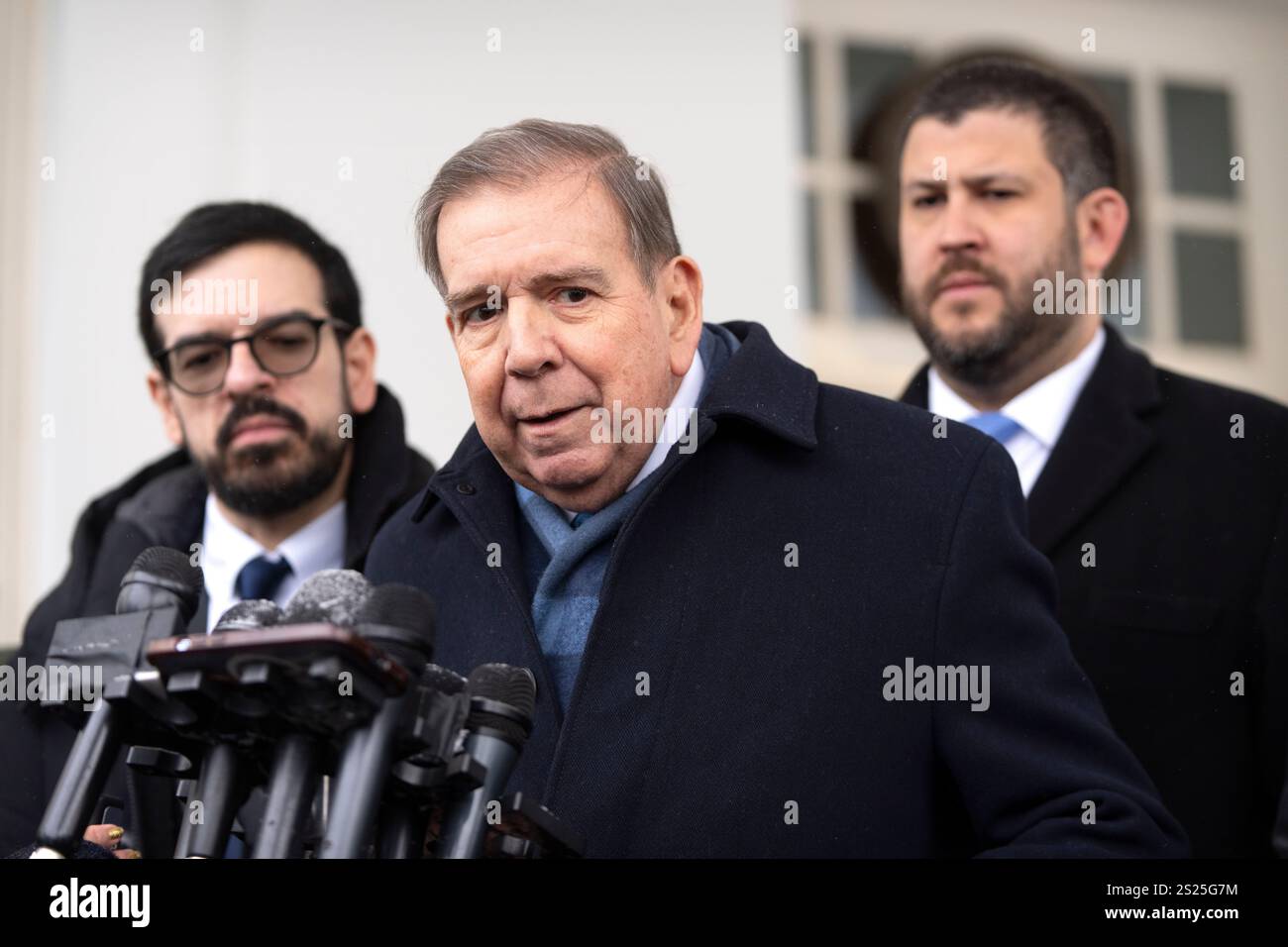 Venezuela's opposition leader Edmundo Gonzalez, center, speaks with ...