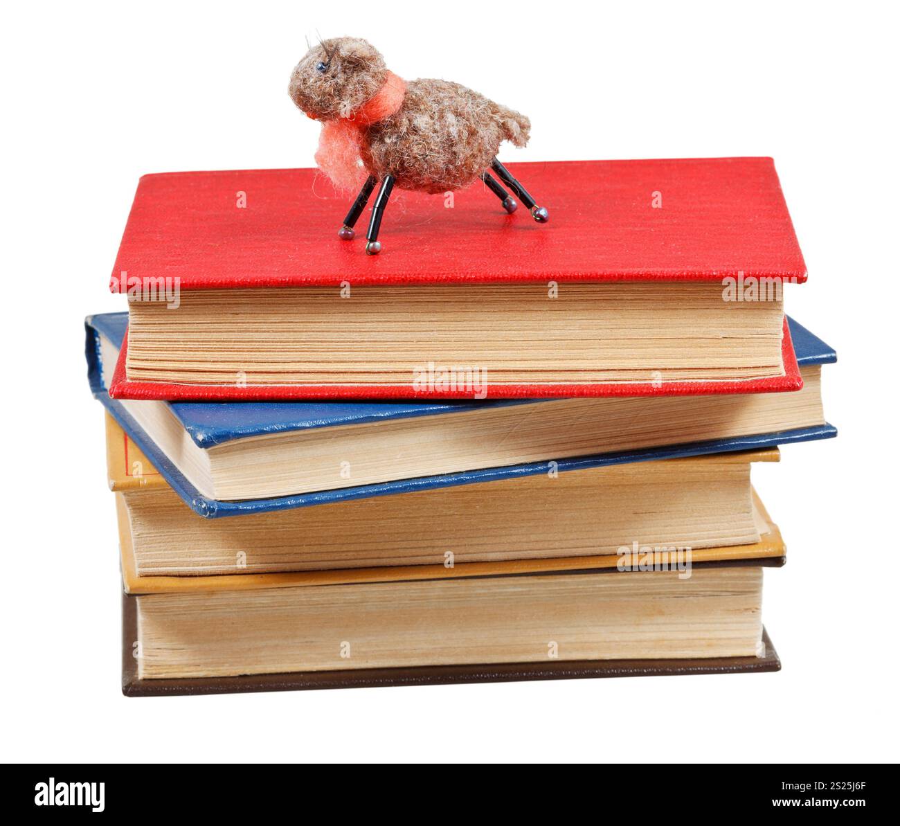 felt soft toy lamb on stack of books isolated on white background Stock ...