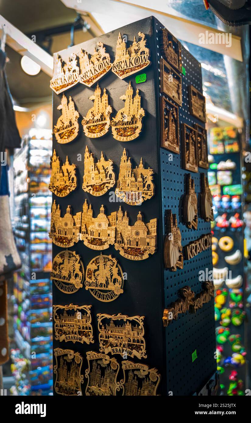 A display of souvenir magnets featuring iconic landmarks of Krakow. The ...