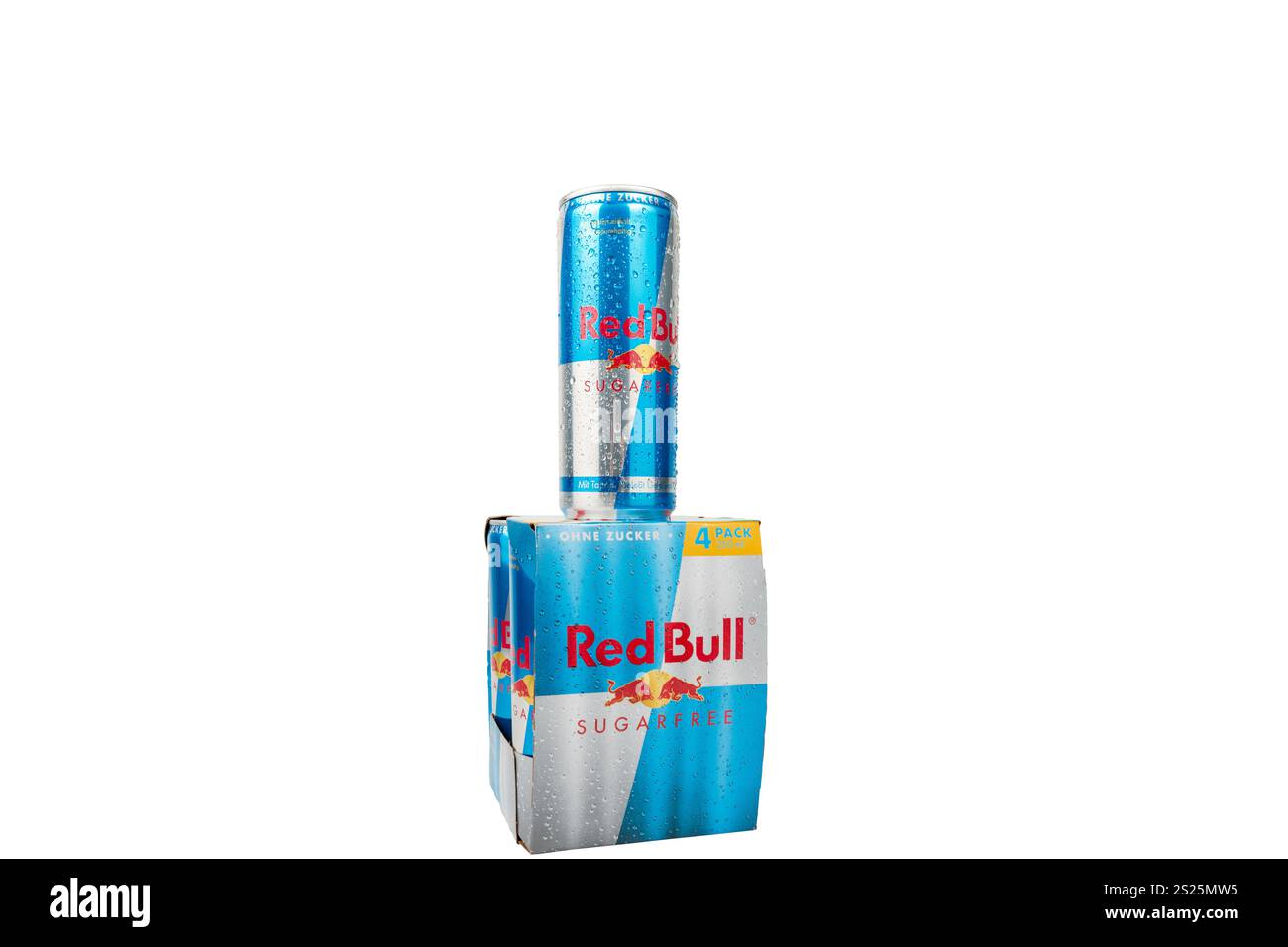 A Red Bull can sits on top of a Red Bull box. The jar is blue-silver ...