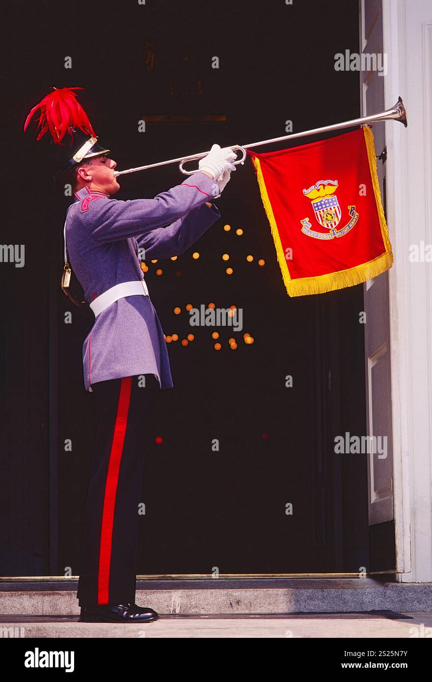 Lone uniformed cadet playing brass horn; Valley Forge Military Academy ...