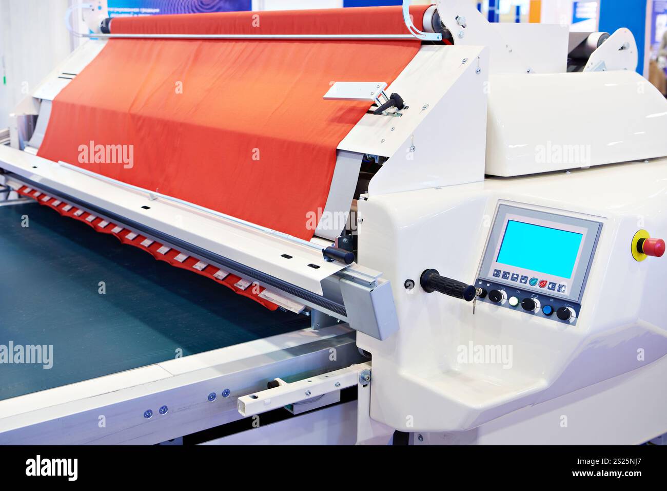 Automatic spreading machine with unique design cradle feed Stock Photo ...