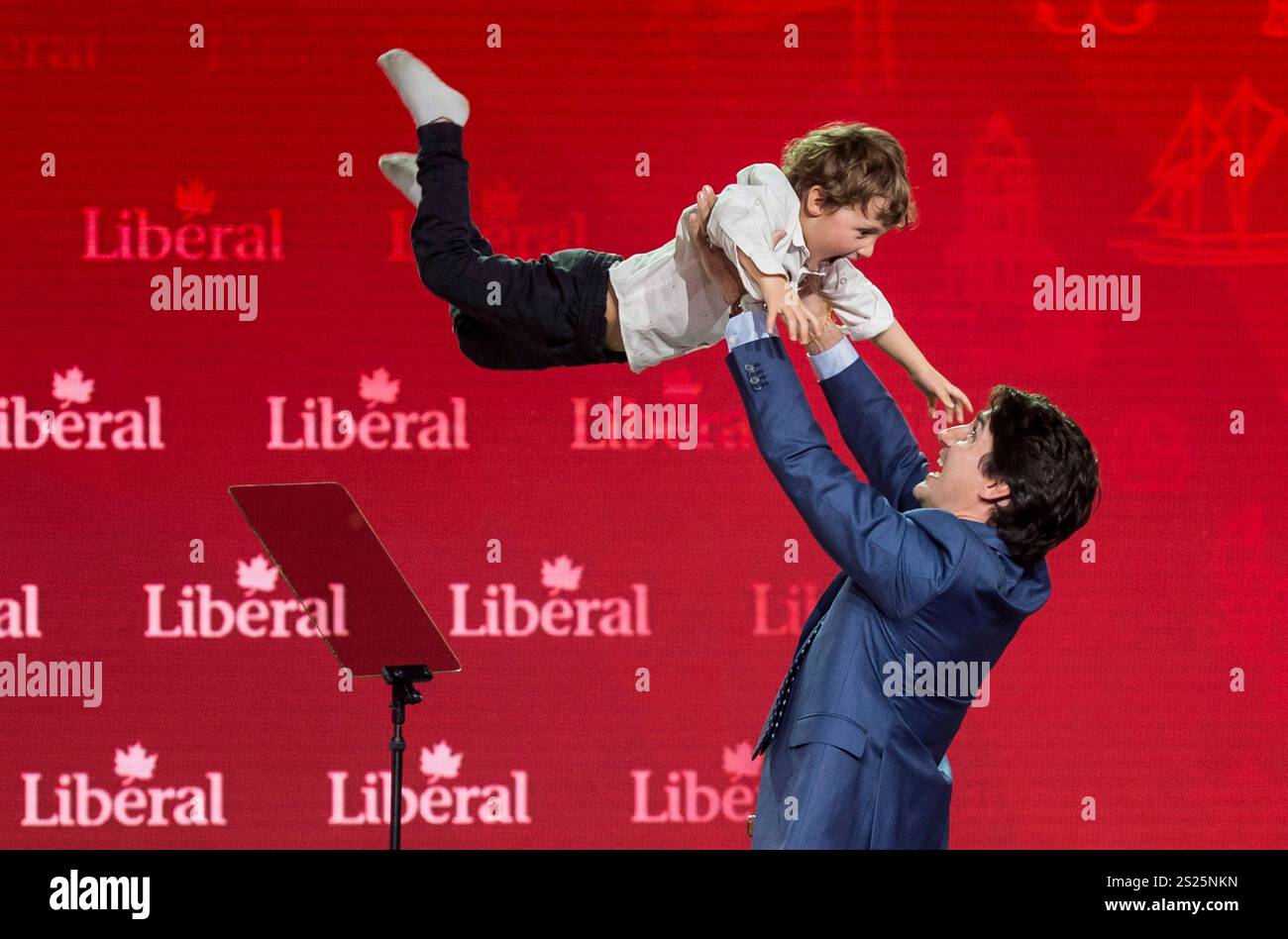 FILE - Prime Minister Justin Trudeau lifts his son Hadrien into the air ...