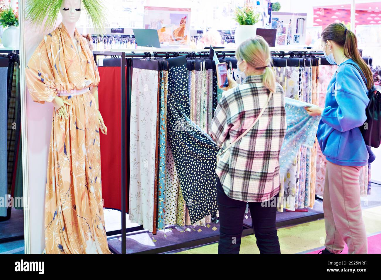 Women hang hi-res stock photography and images - Alamy