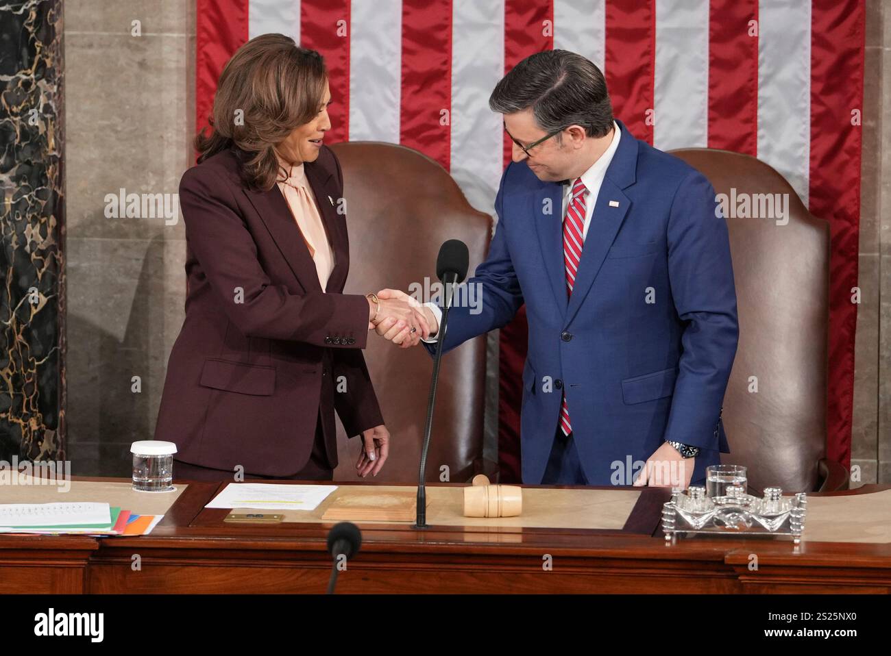 Vice President Kamala Harris shakes hands with House Speaker Mike ...